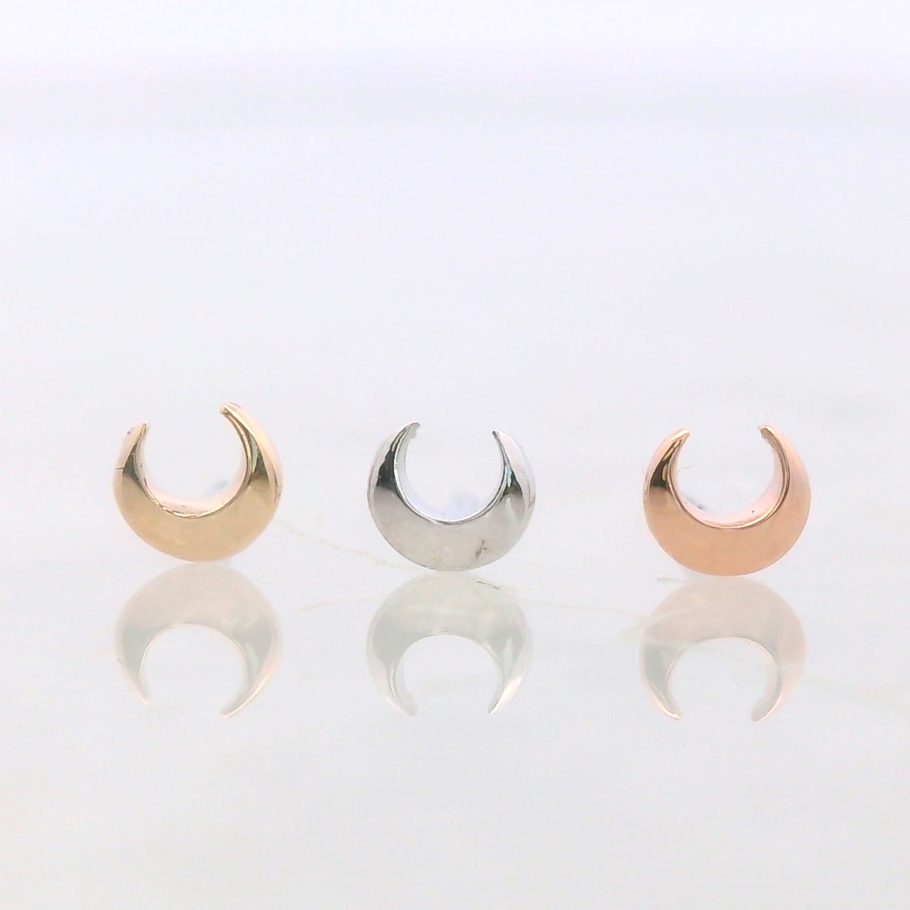 Tiny Crescent Moon – Ivy Piercing Studios